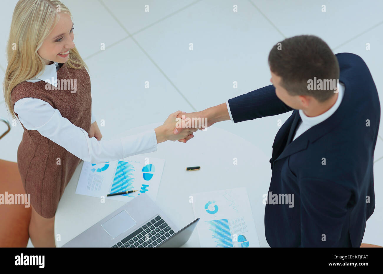 business handshake in modern office Stock Photo - Alamy