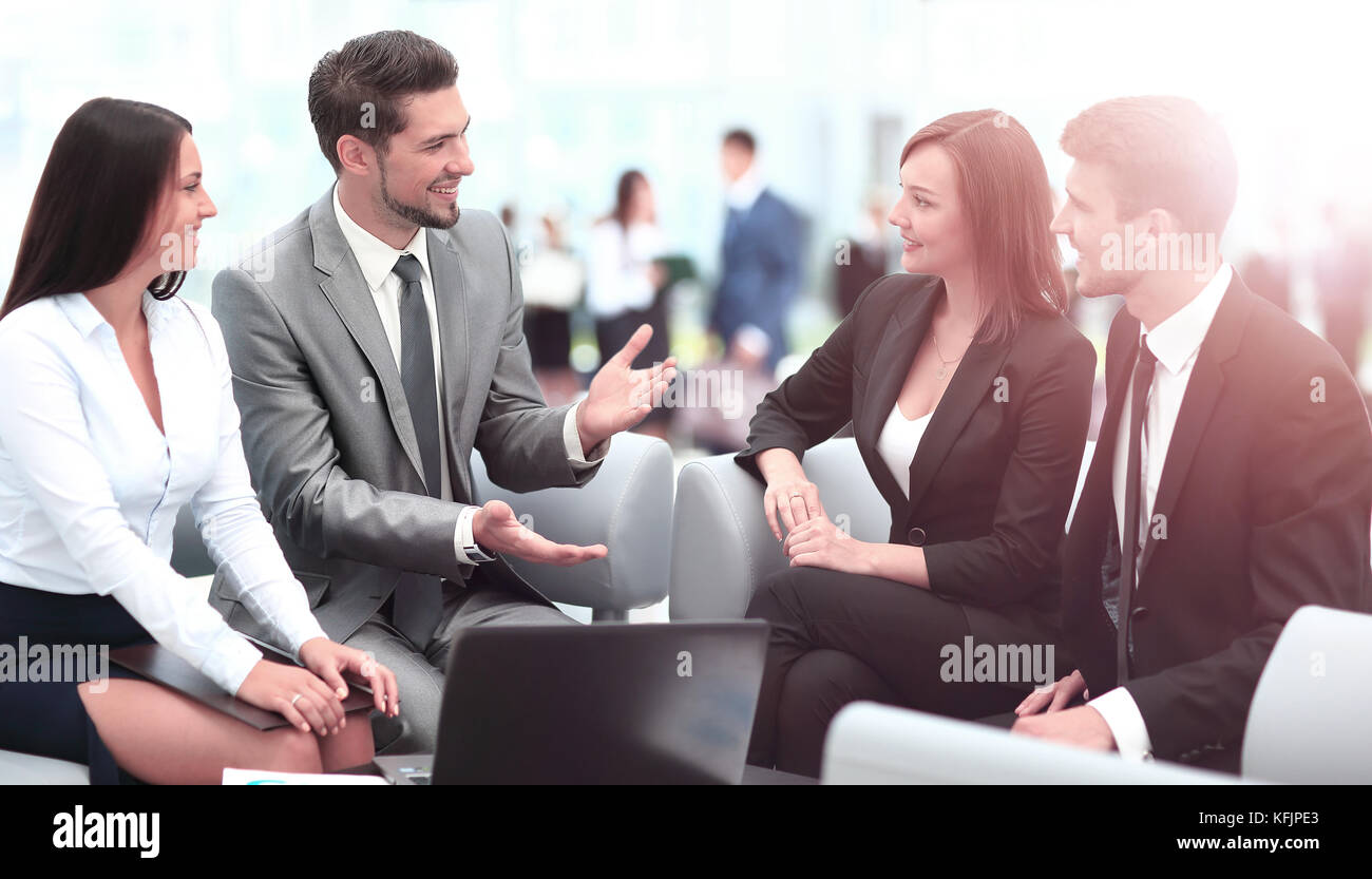 Business team discussing together plans Stock Photo - Alamy