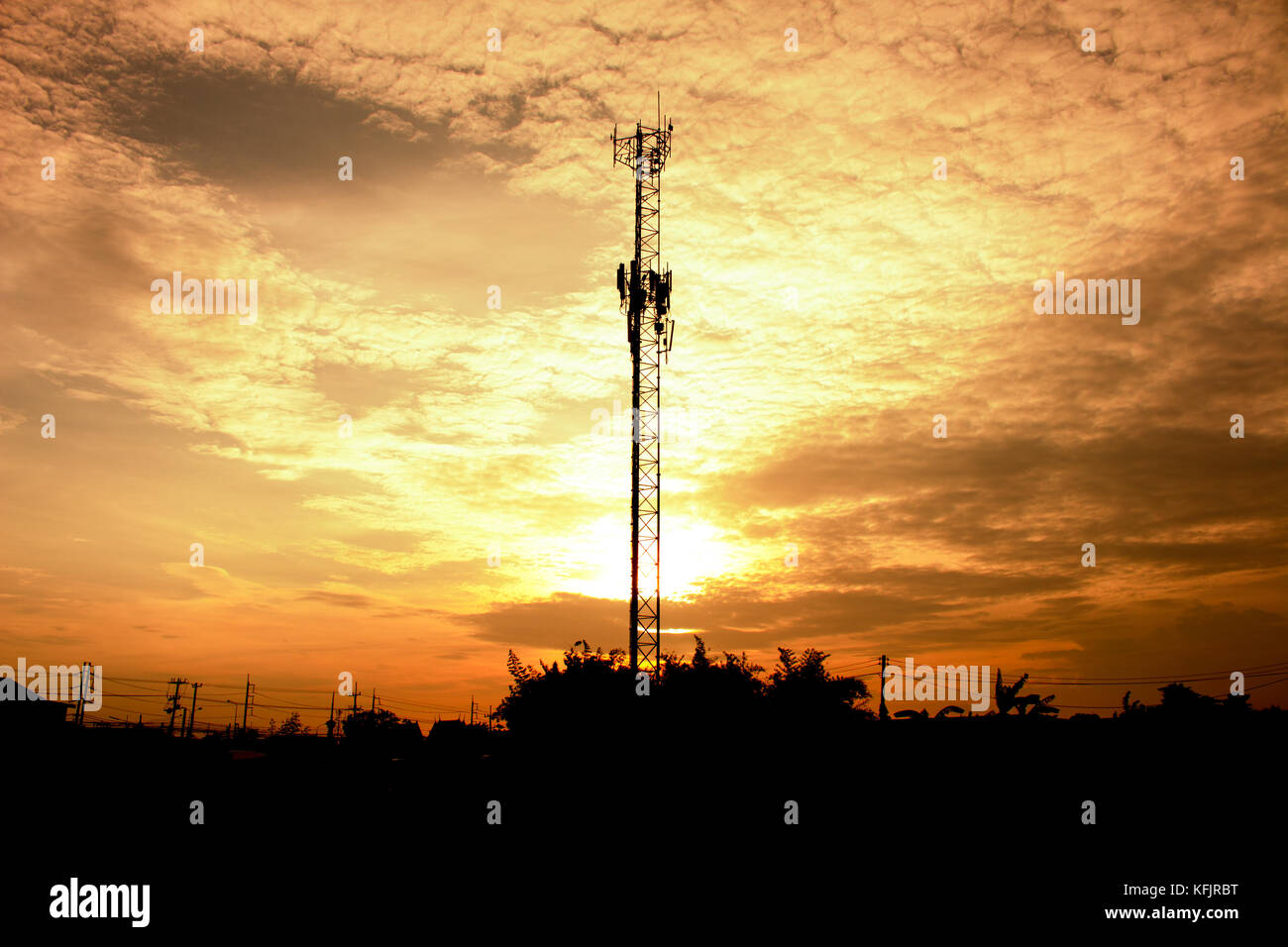 The Communication tower and sunlight in evening Stock Photo - Alamy