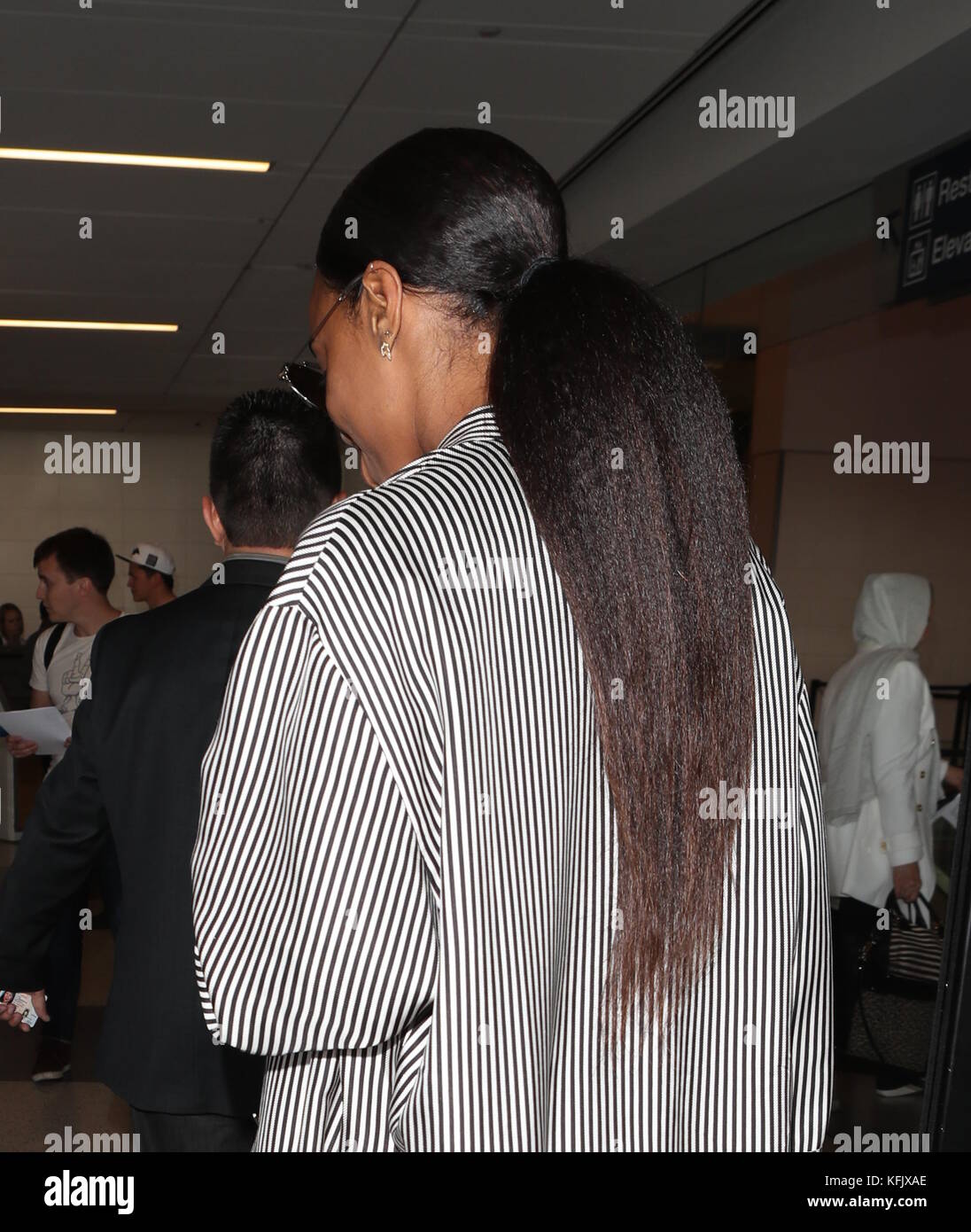 Kelly Rowland smiles for the camera at Los Angeles International ...