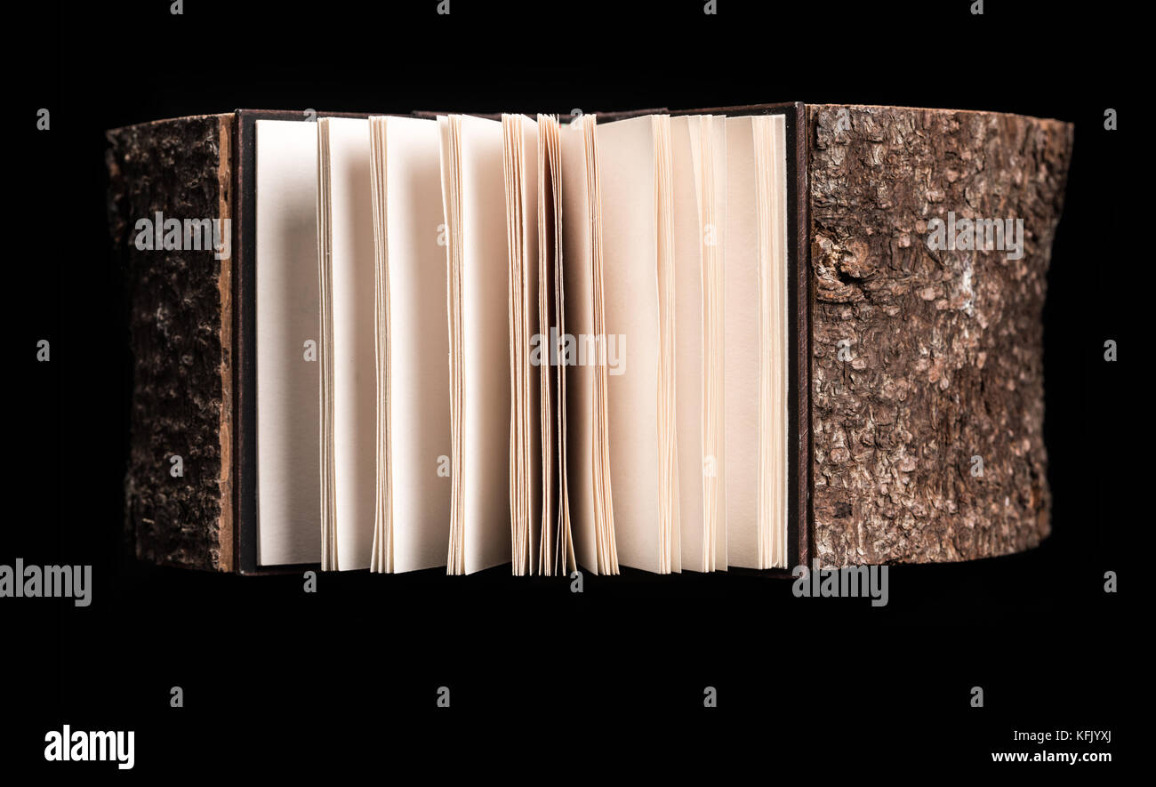 Conceptual image about the cross section of the tree trunk and book on ...