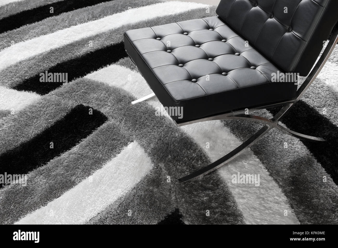 modern soft chair on the carpet Stock Photo - Alamy