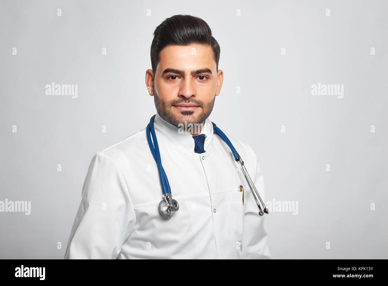 Young handsome hispanic male doctor hi-res stock photography and images ...