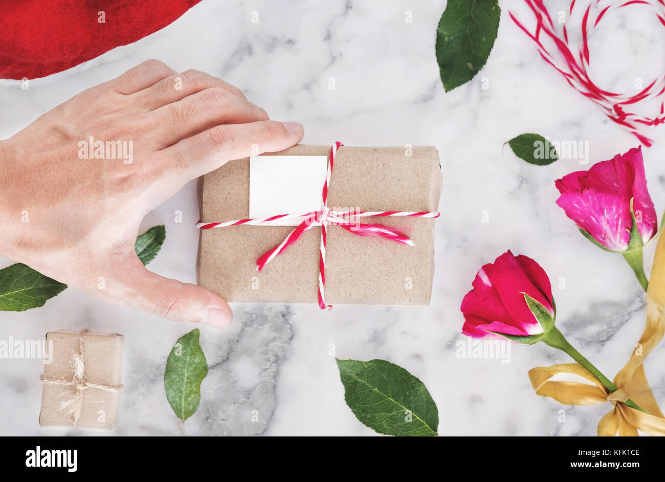 Hand preparing present for Christmas, Valentines and Birthday Day, on ...