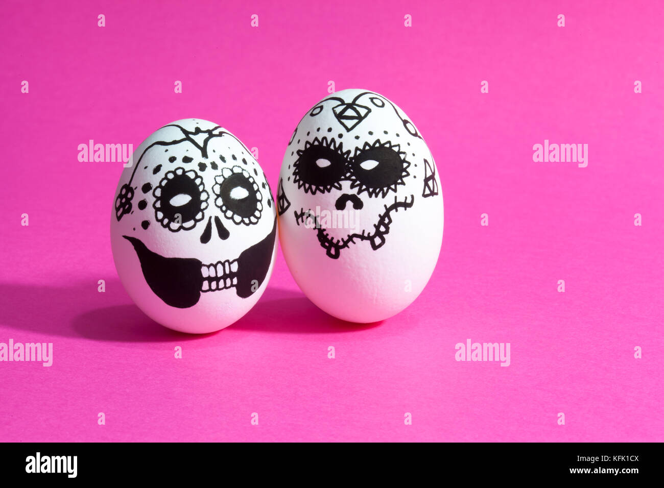 The dead eggs standing on colored background Stock Photo - Alamy