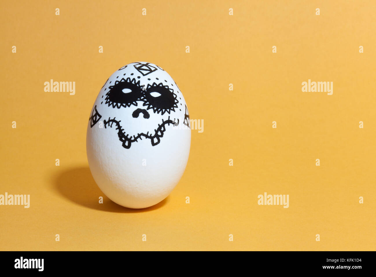 The dead eggs standing on colored background Stock Photo - Alamy