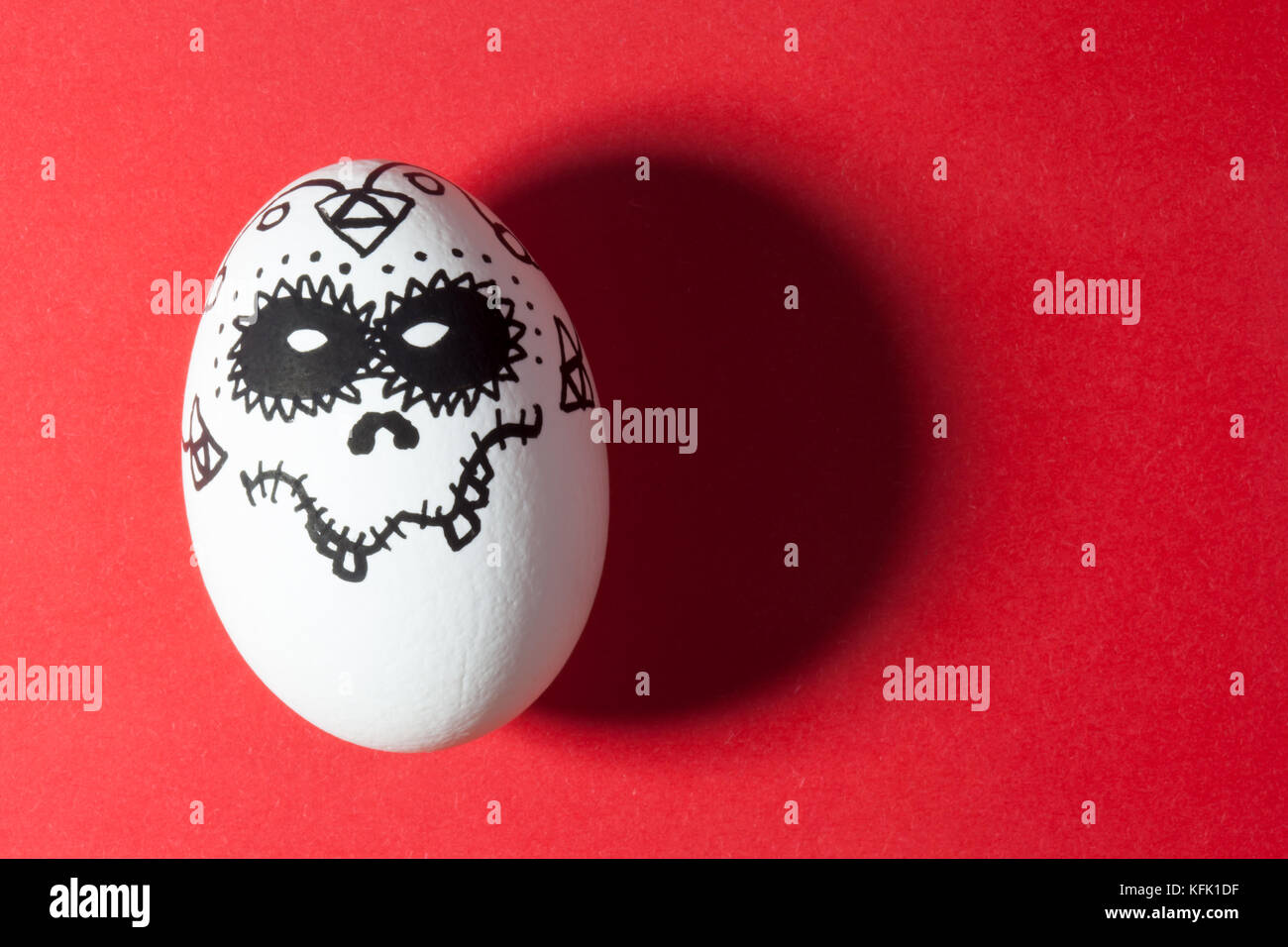 The dead eggs lying on colored background Stock Photo - Alamy