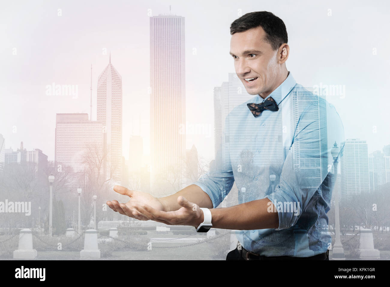 Cheerful nice man looking in front of him Stock Photo - Alamy