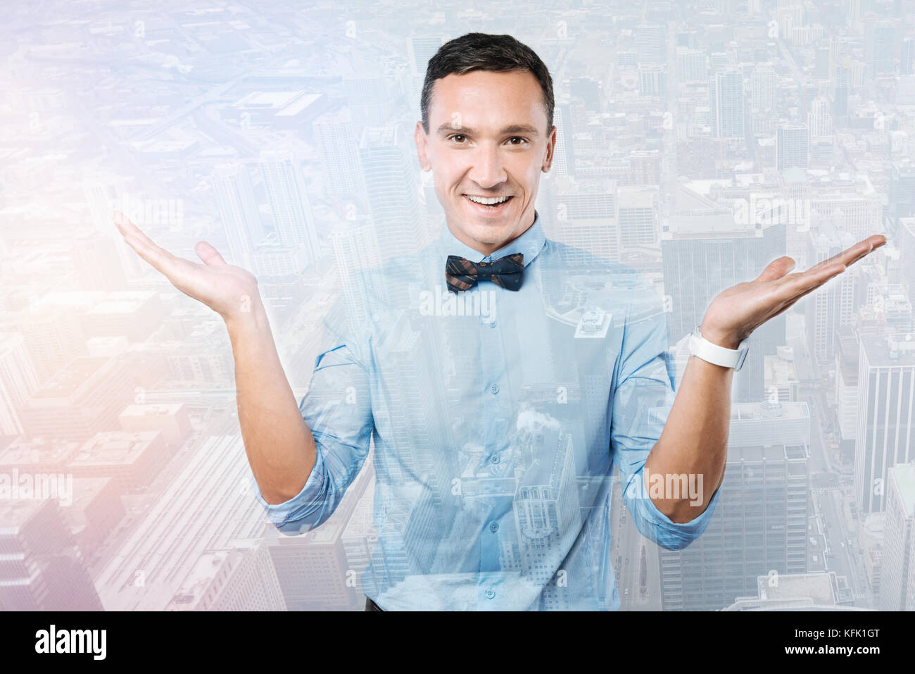 Joyful nice man smiling Stock Photo - Alamy