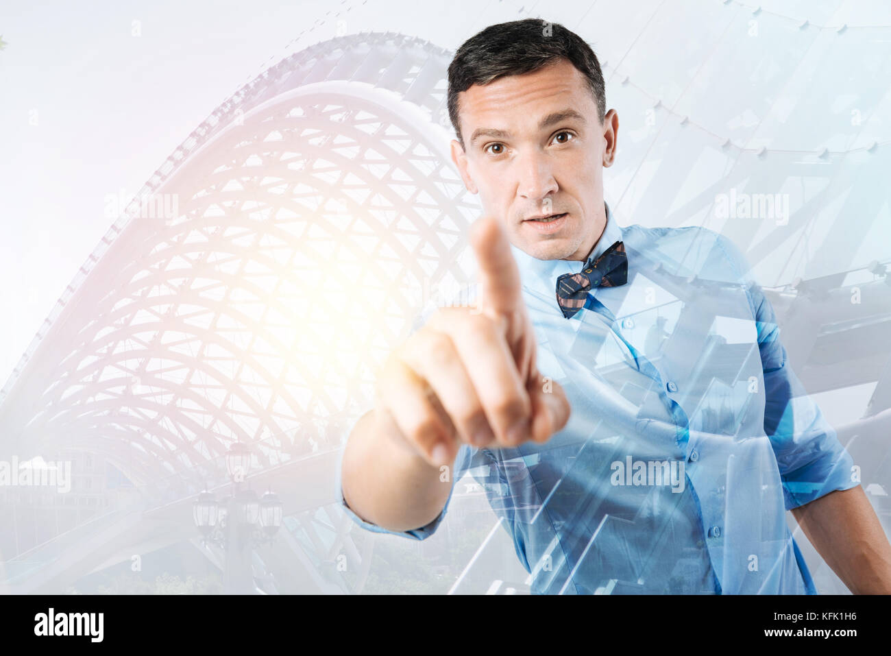 Handsome smart man pointing at you Stock Photo - Alamy