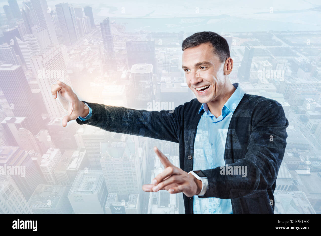 Positive delighted man smiling Stock Photo - Alamy