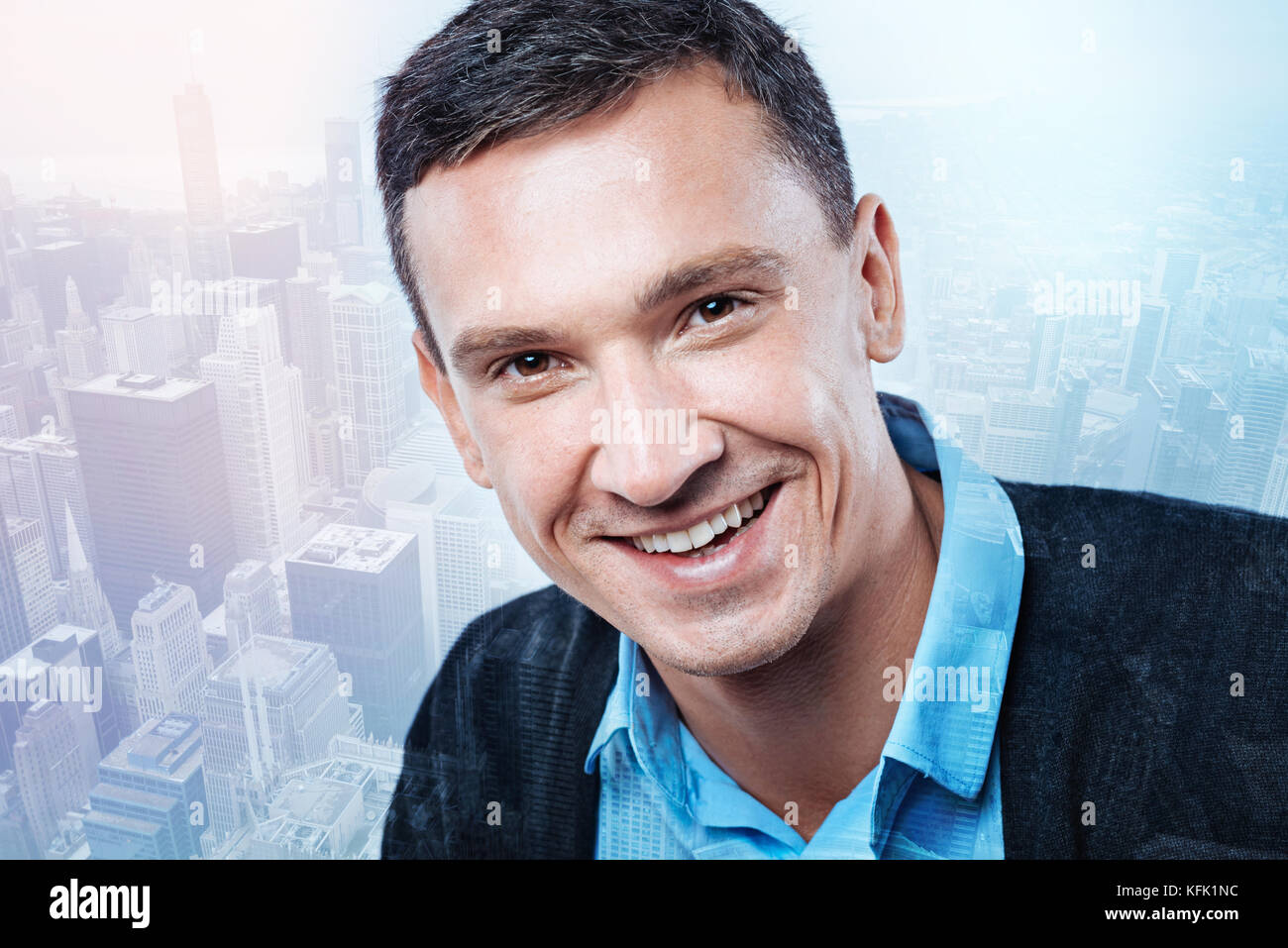 Portrait of a delighted handsome man looking at you Stock Photo - Alamy