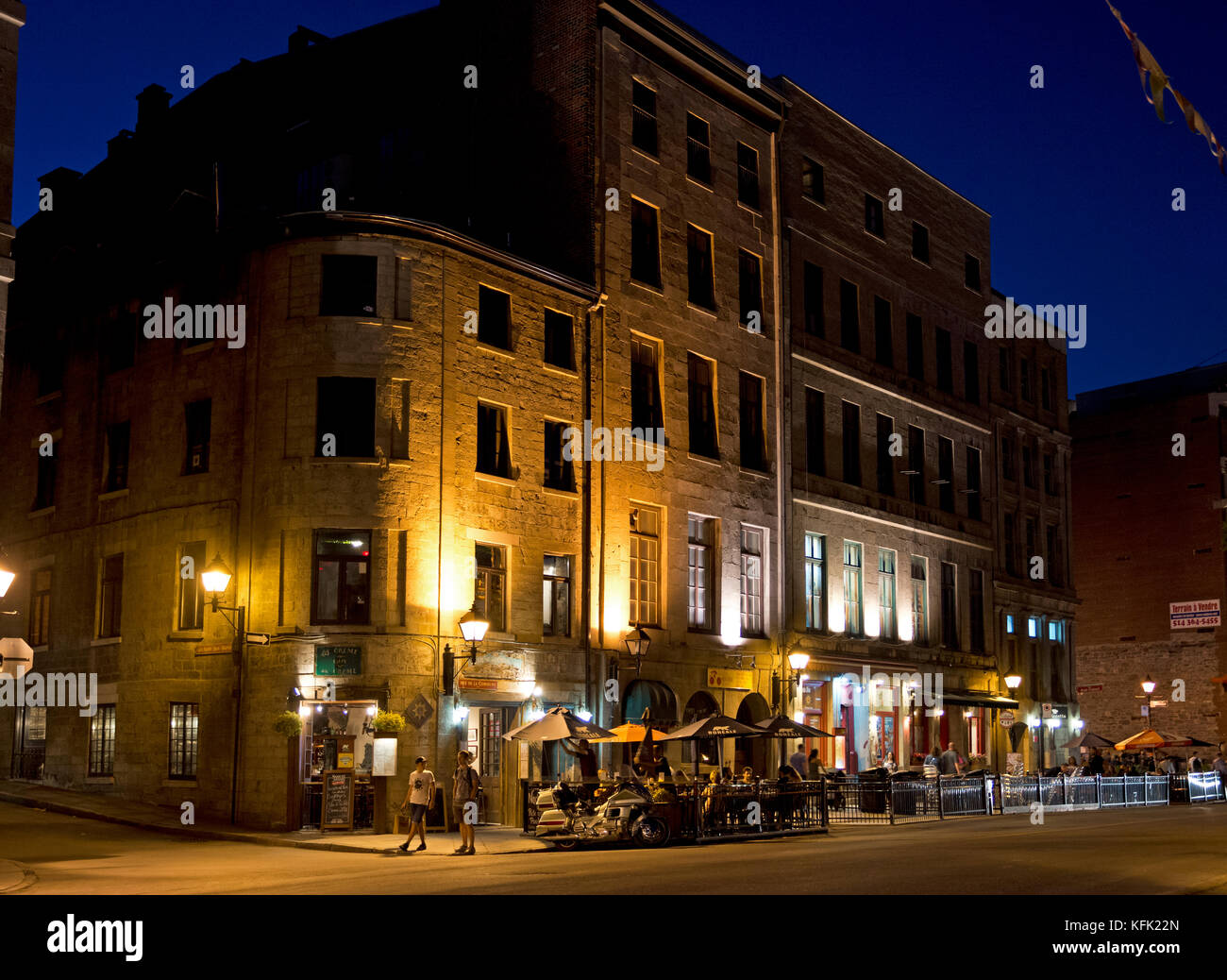 Cafe on the street in Old Montreal, Quebec, Canada at night Stock Photo ...