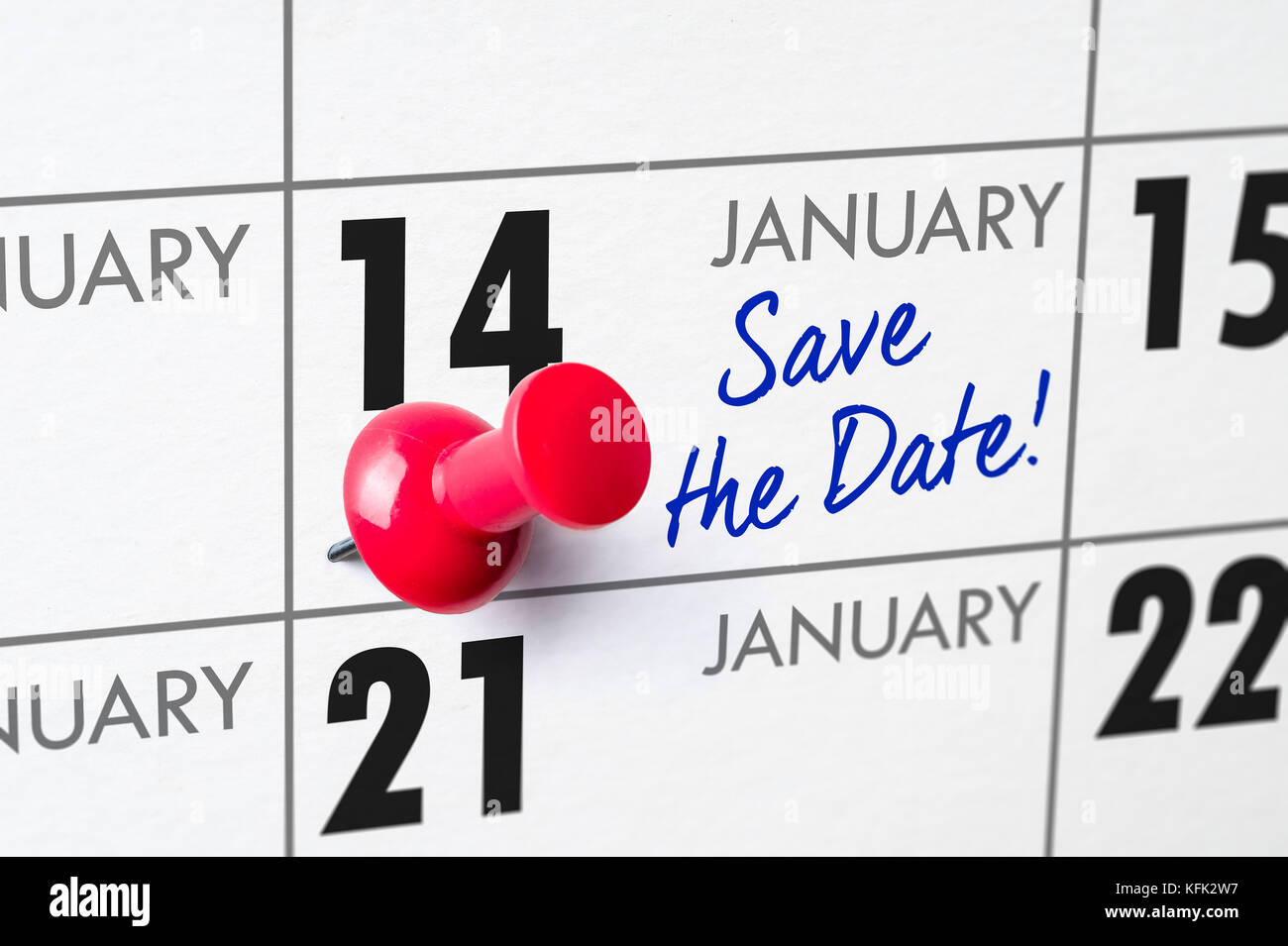 Wall calendar with a red pin - January 14 Stock Photo - Alamy