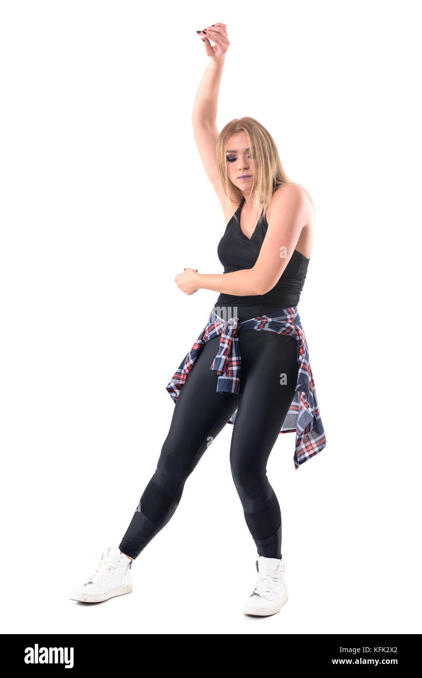 Elegant female jazz dance enjoying music and dancing looking down. Full ...