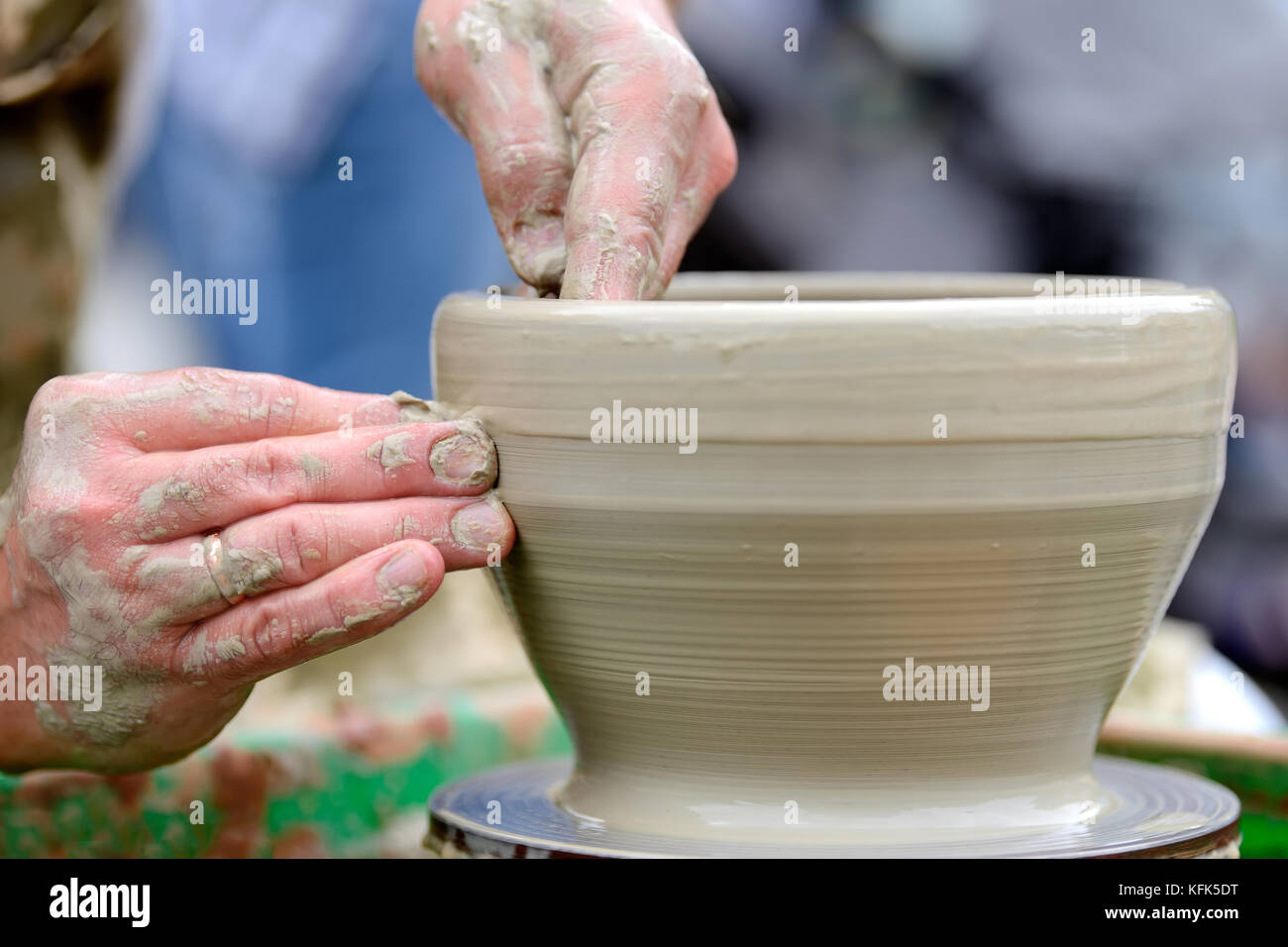 Hands of a potter. Potter making ceramic pot on the pottery wheel Stock ...