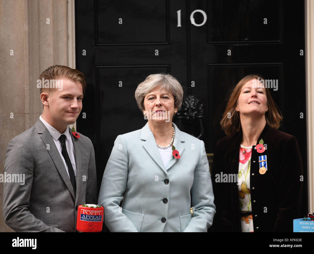 Prime Minister Theresa May makes a donation to the Royal British Legion ...