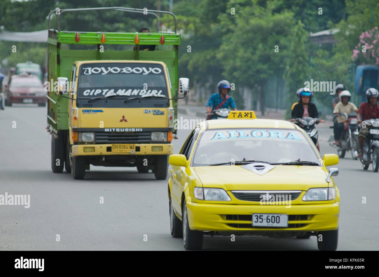 Traffic on a busy street in Dili, Timor-Leste (East Timor). Owners of ...