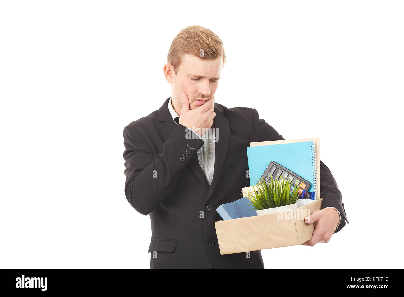 Employee with personal belongings Stock Photo - Alamy