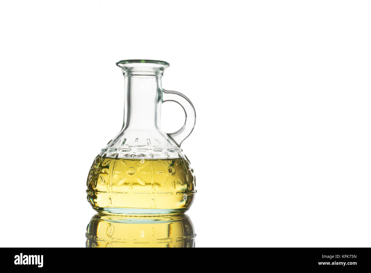 Small bottle of olive oil isolated in front of white background Stock ...