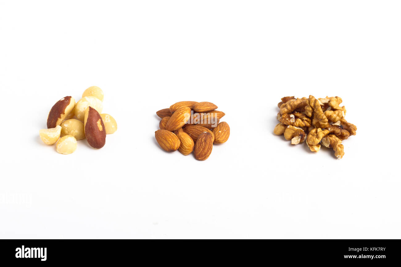 3 types of nuts over white Stock Photo - Alamy