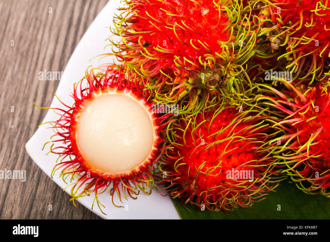 Fresh ripe sweet Rambutan heap - asian fruit Stock Photo - Alamy
