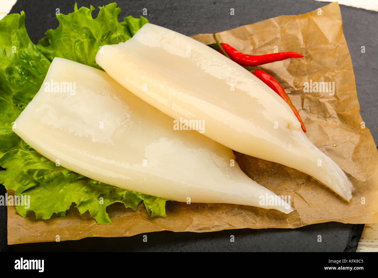 Raw squid fillet ready for cooking Stock Photo - Alamy