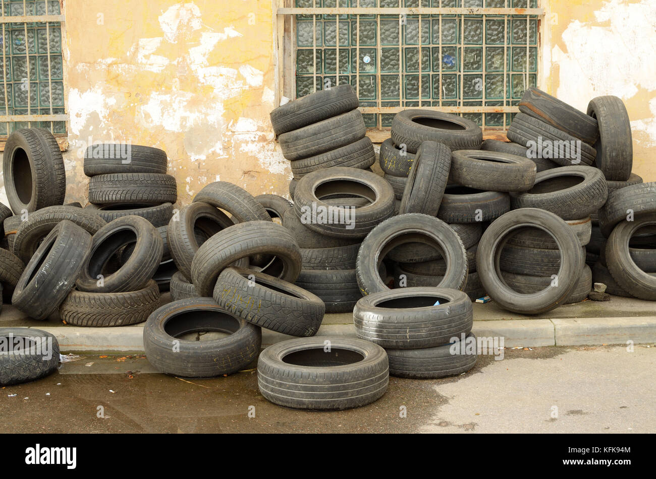 Worn-out tyres from vehicles or discarded as waste in the trash Stock ...