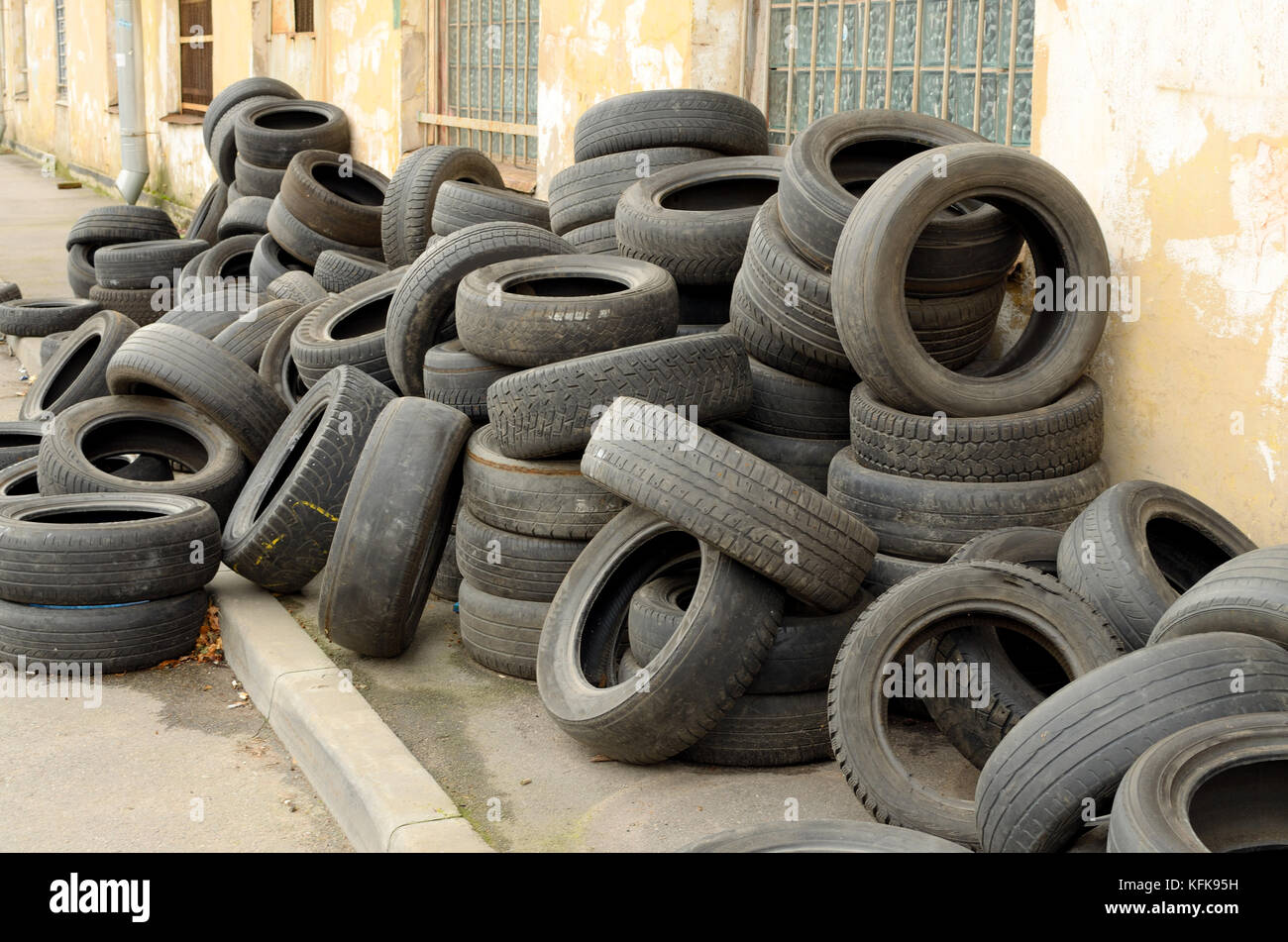 Worn-out tyres from vehicles or discarded as waste in the trash Stock ...