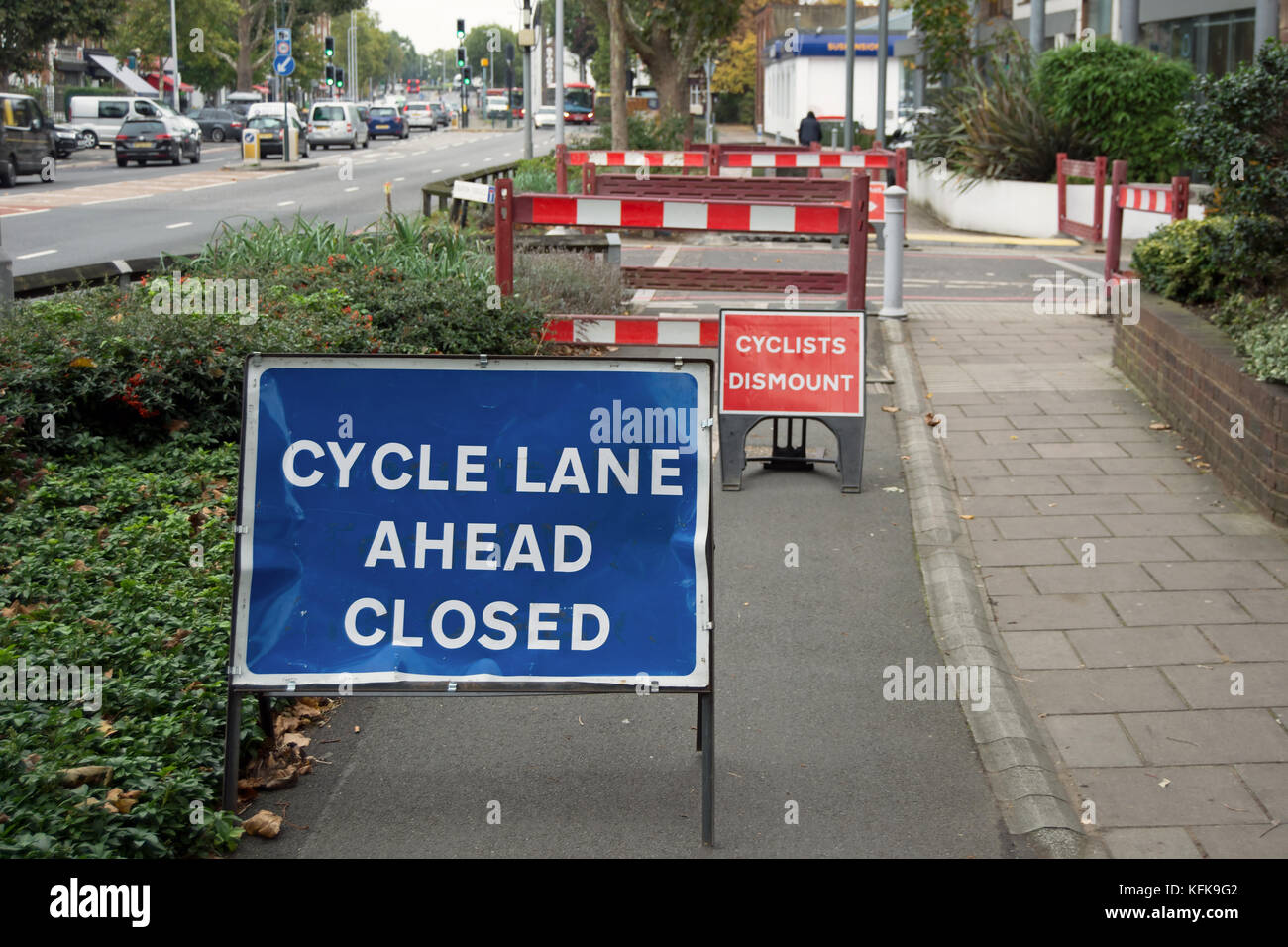 cycle lane closed sign and cyclists dismount sign at street works in ...