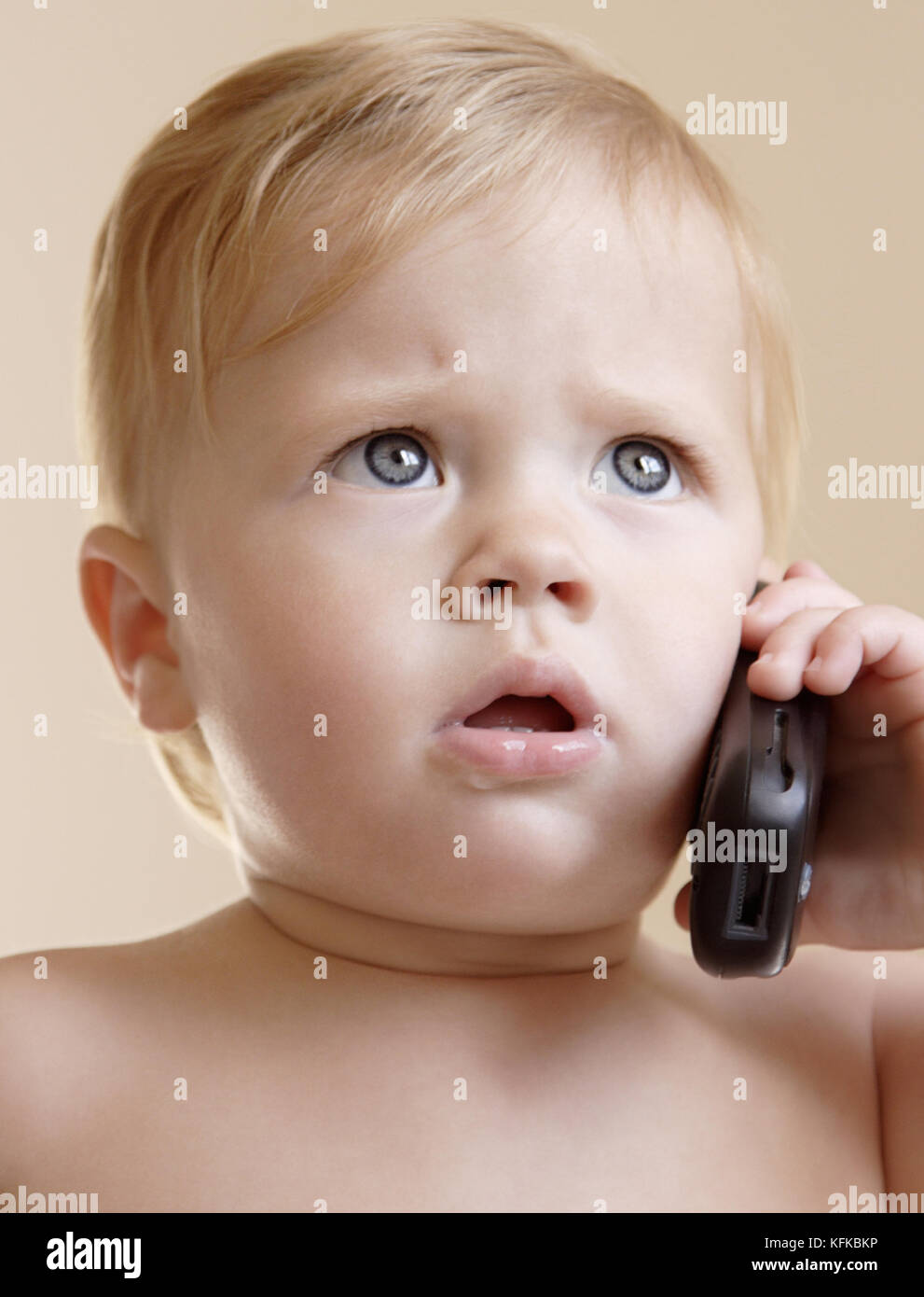Little boy with phone Stock Photo - Alamy