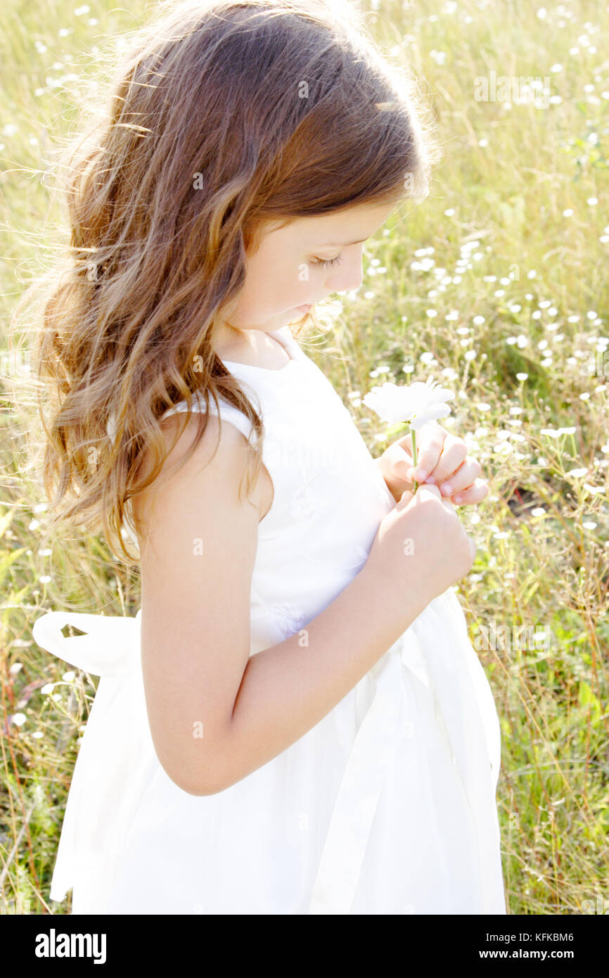 Little girl with flower Stock Photo - Alamy