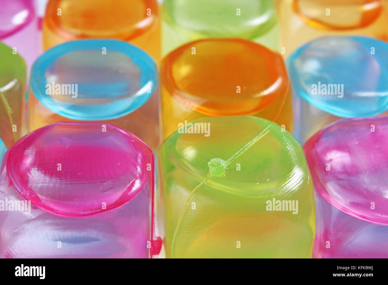 Plastic ice cubes. Colorful ice cube pattern Stock Photo - Alamy