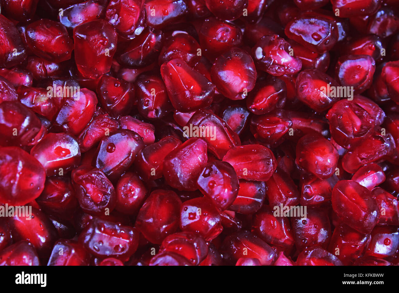 Red ruby pomegranate seeds. Pomegranate seed texture closeup photo ...