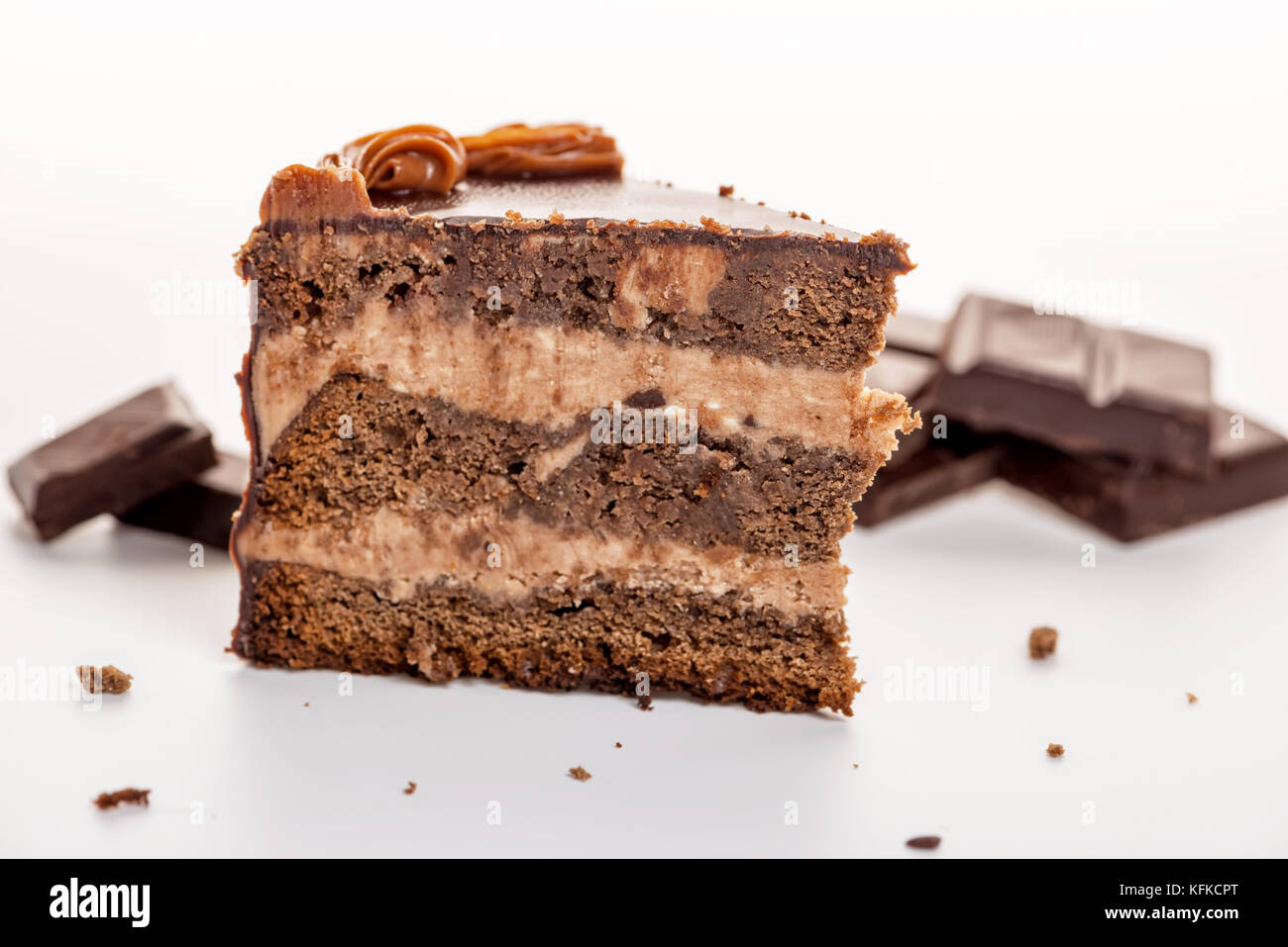chocolate cake with chocolate broken isolated on white Stock Photo - Alamy