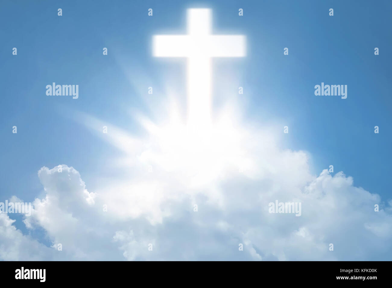 The bright cross over clouds at sky background Stock Photo - Alamy