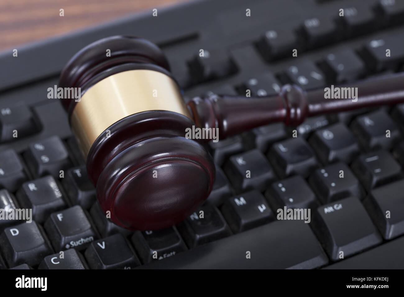 Closeup of mallet on computer keyboard in courtroom Stock Photo - Alamy
