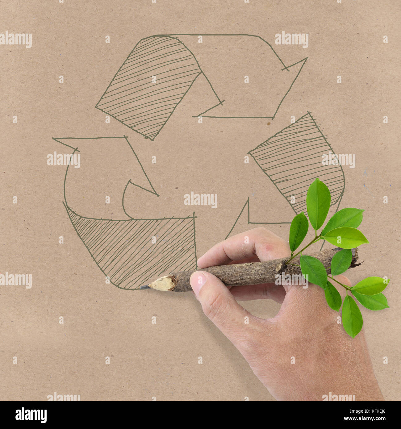 Male hand drawing recycle symbol on Brown Recycled Paper Stock Photo ...