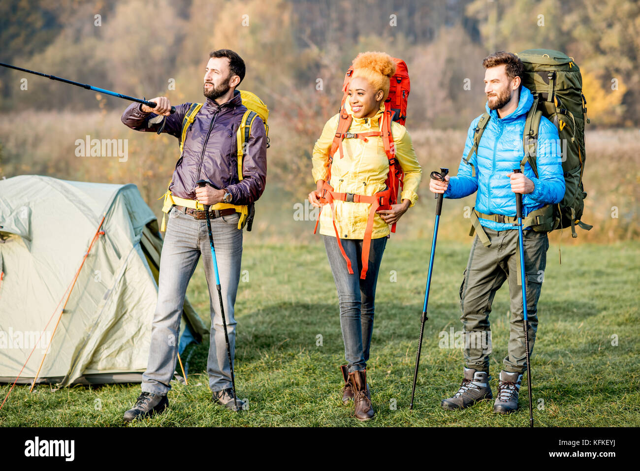 Hikers with backpacks outdoors Stock Photo - Alamy
