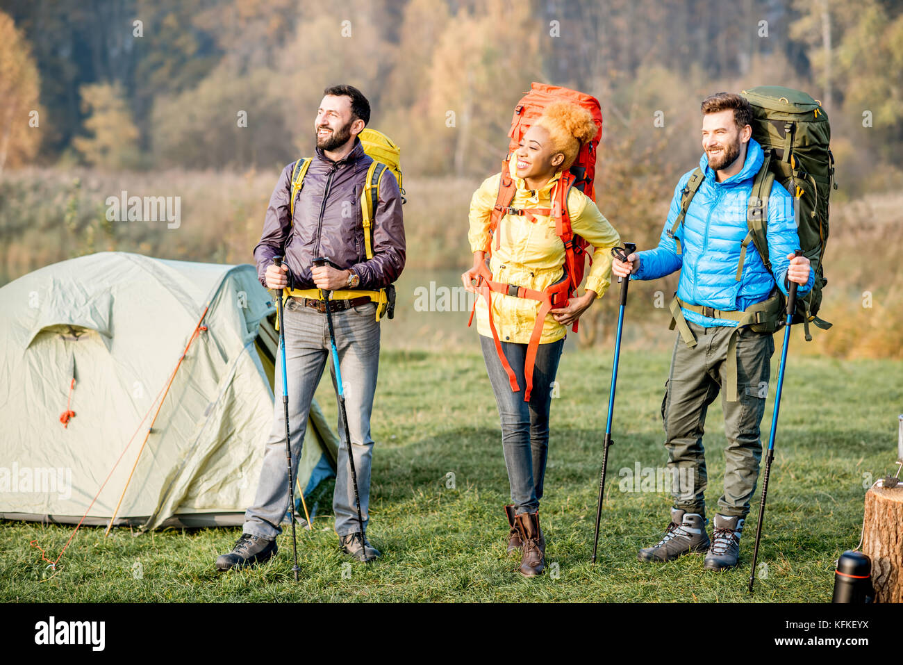 Hikers with backpacks outdoors Stock Photo - Alamy