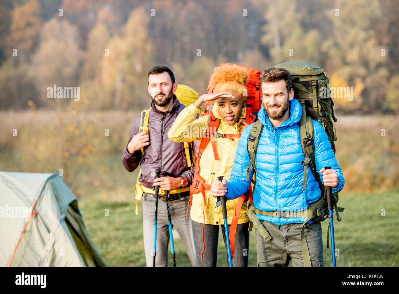 Hikers with backpacks outdoors Stock Photo - Alamy