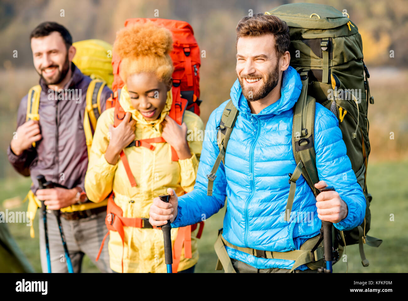 Hikers with backpacks outdoors Stock Photo - Alamy