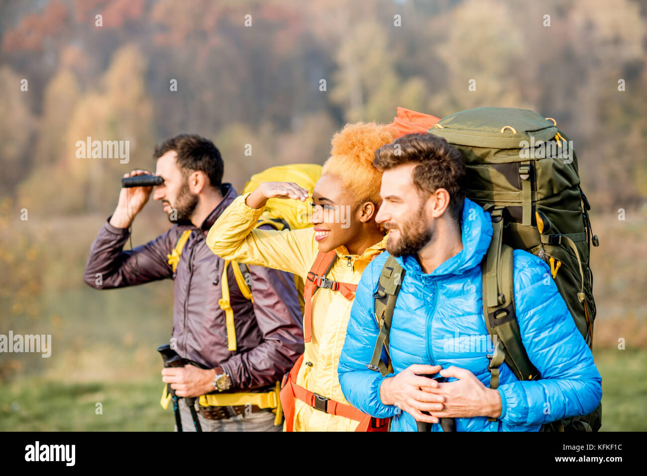 Hikers with backpacks outdoors Stock Photo - Alamy