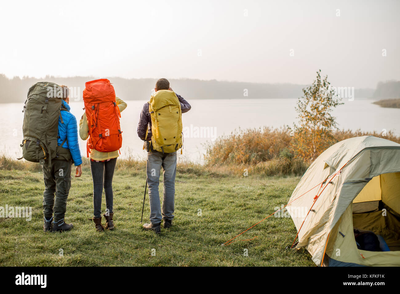 Hikers with backpacks outdoors Stock Photo - Alamy