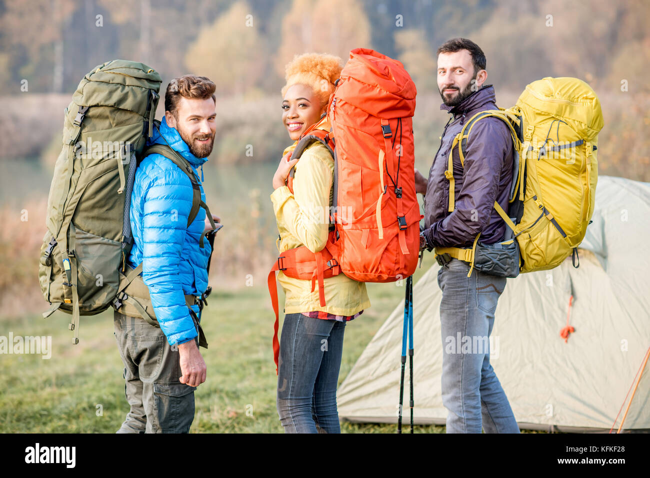 Hikers with backpacks outdoors Stock Photo - Alamy