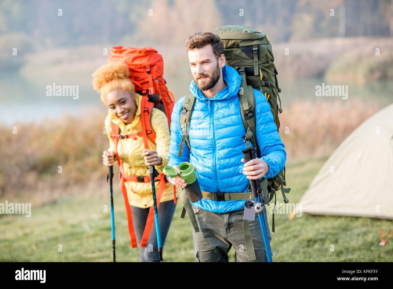 Hikers with backpacks outdoors Stock Photo - Alamy