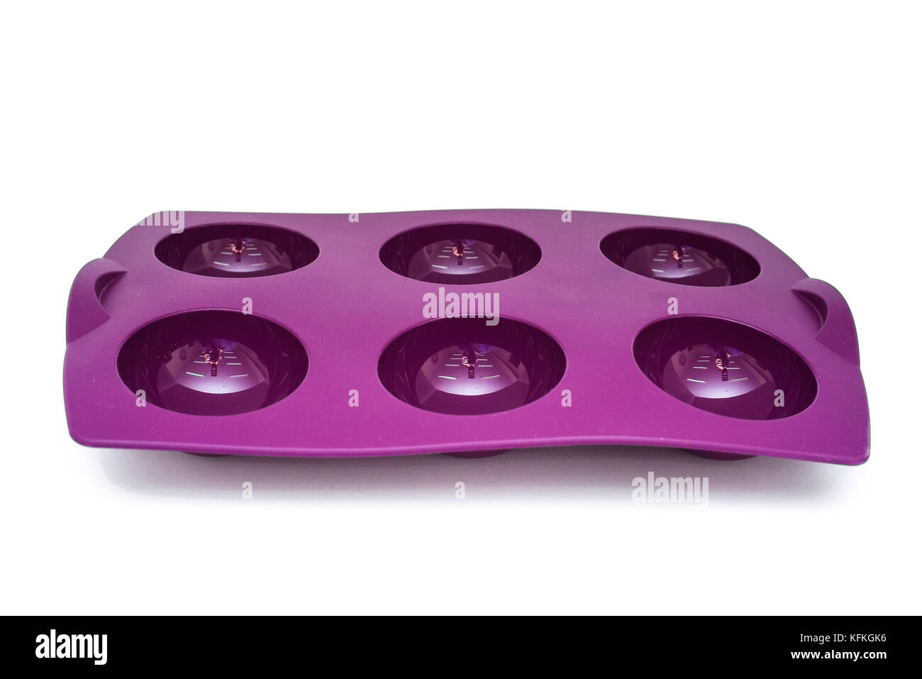 Bright violet silicone muffin pan isolated Stock Photo - Alamy