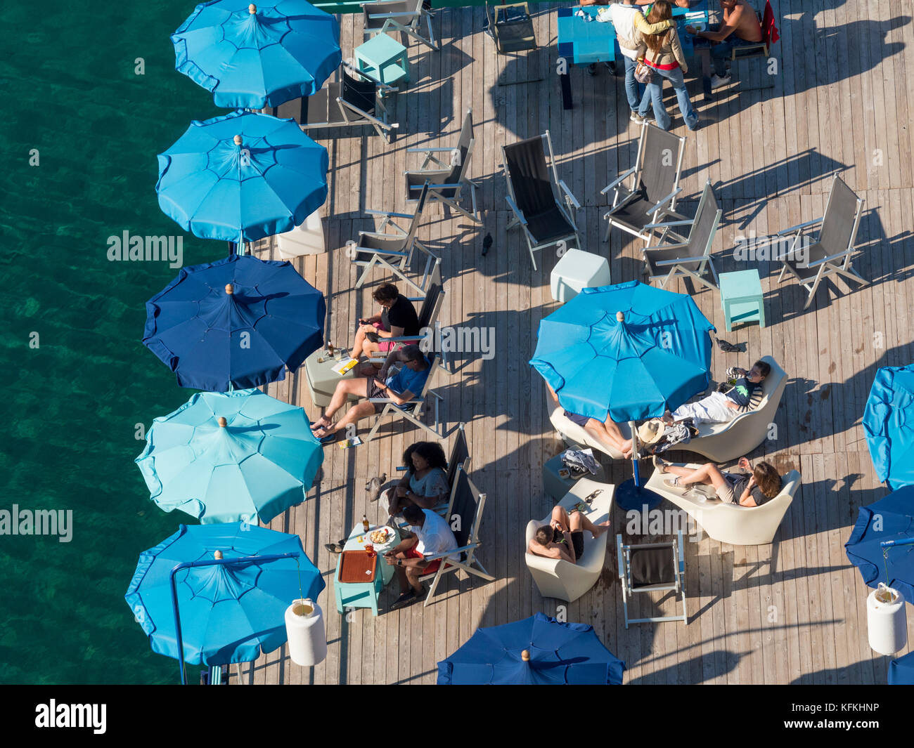 Italian woman sunbathing on beach hi-res stock photography and images ...
