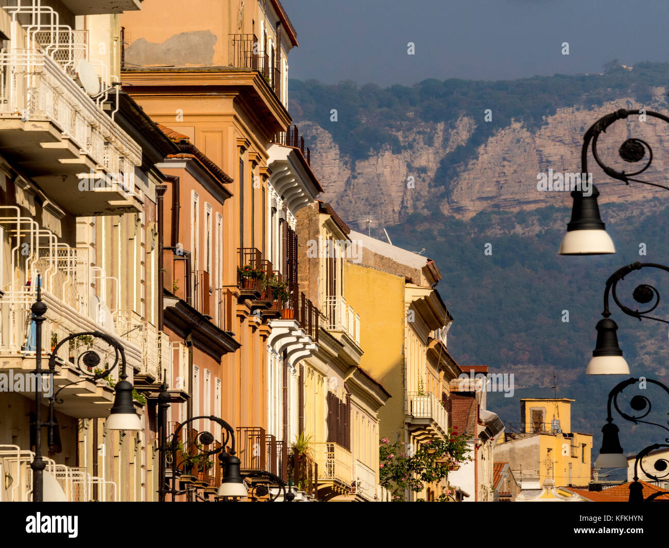 Yellow and orange rendered buildings along Corso Italia. Main shopping ...