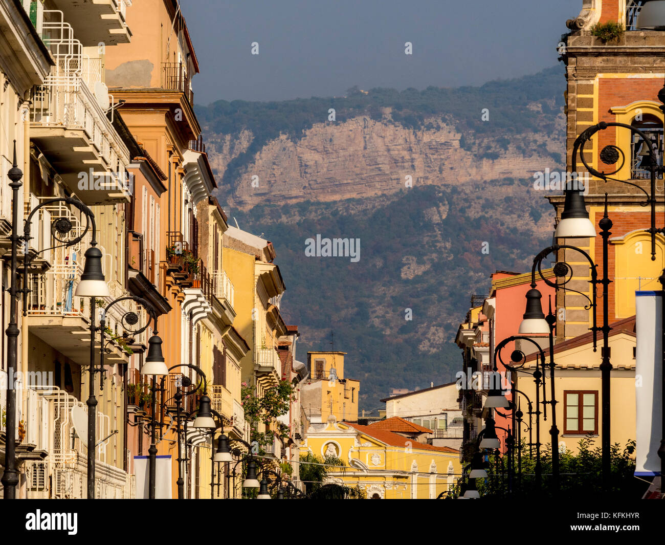 Yellow and orange rendered buildings along Corso Italia. Main shopping ...